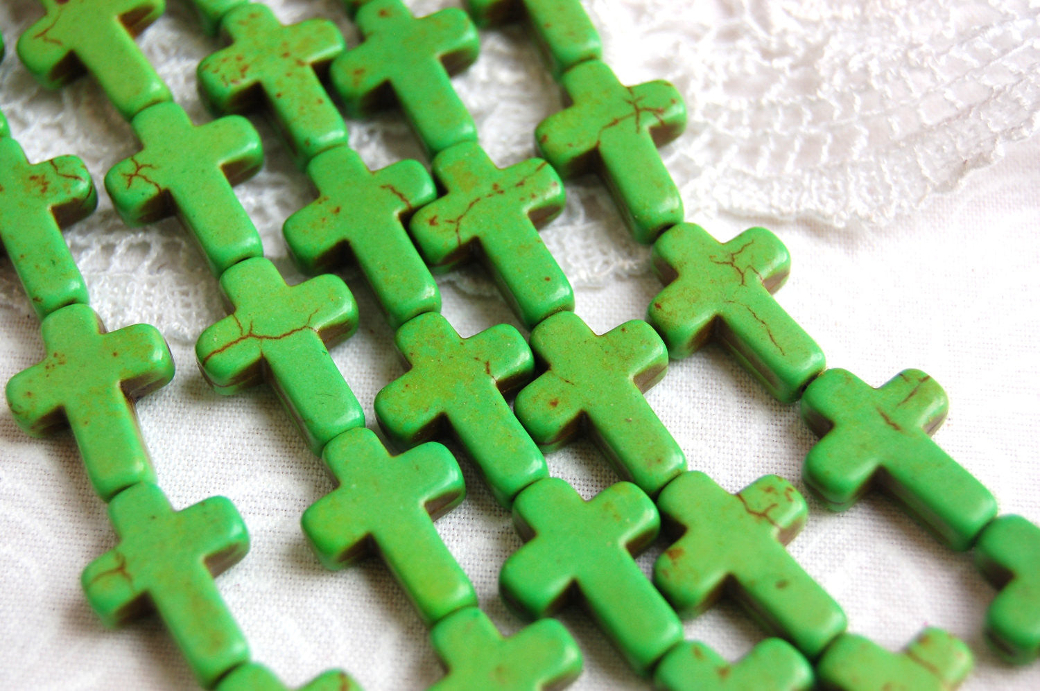 1 Strand Small Stone Cross Beads in GREEN. Sideways cross 16x12mm how0