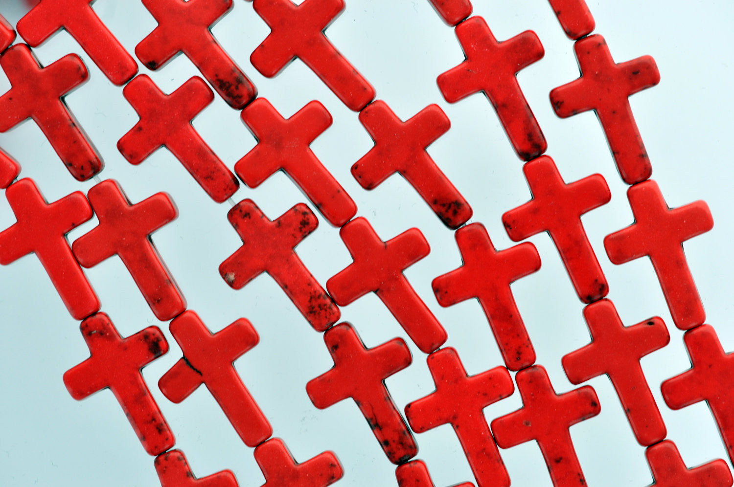 1 Strand Small Stone Cross Beads in CRIMSON RED . Sideways Cross 16x12
